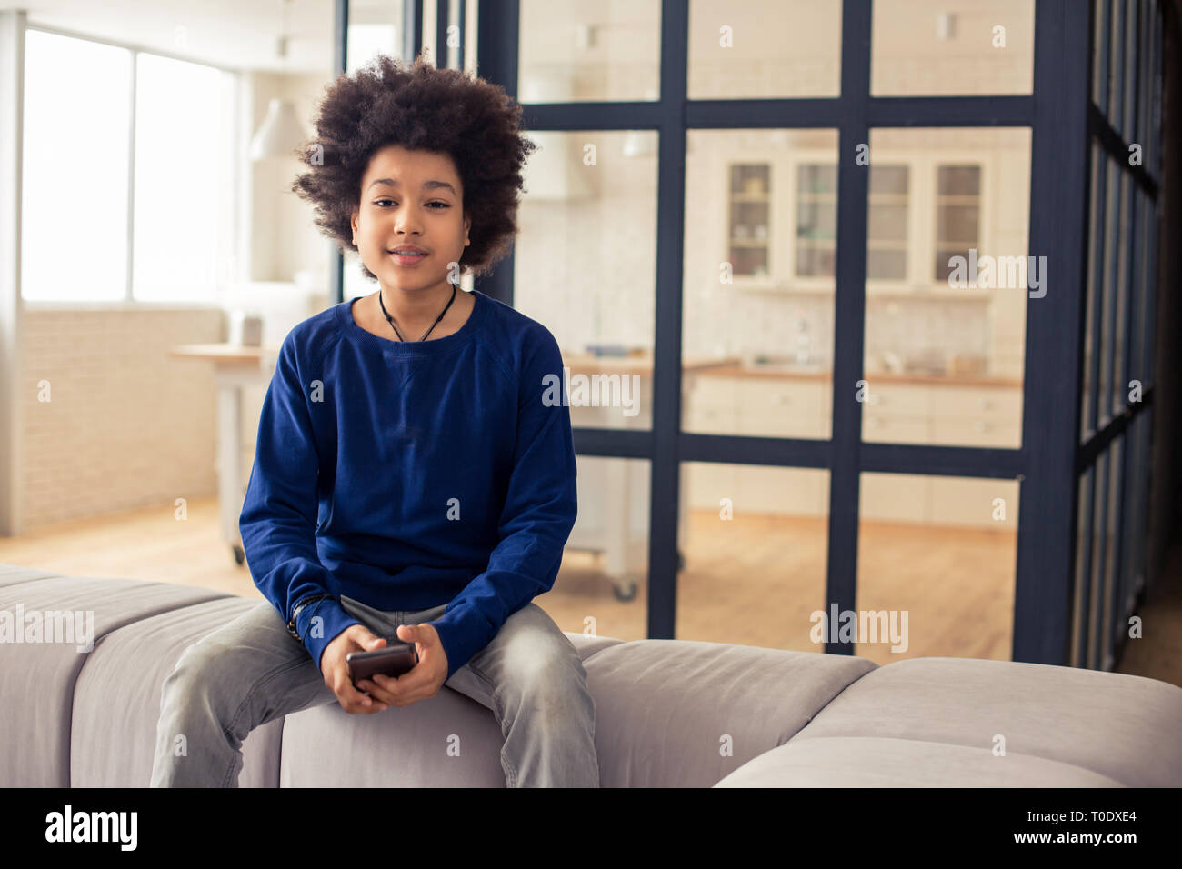 Male teenager looking straight camera hi-res stock photography and ...