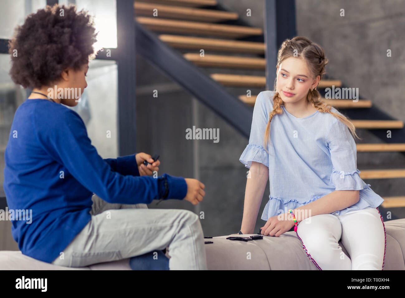 Cute teenager being deep in her thoughts Stock Photo - Alamy