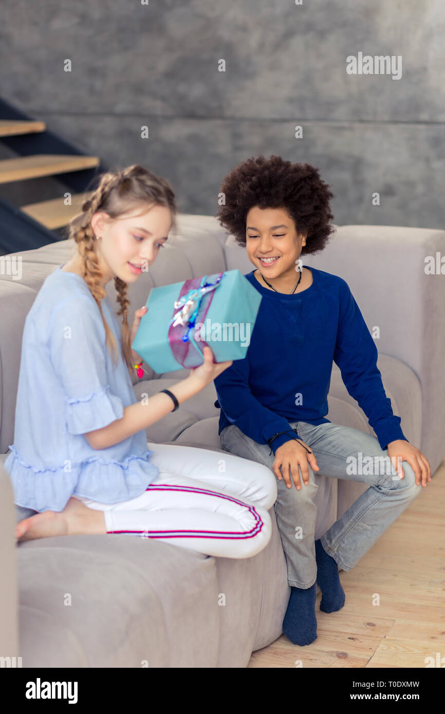 Kid guessing inside the box hi-res stock photography and images - Alamy