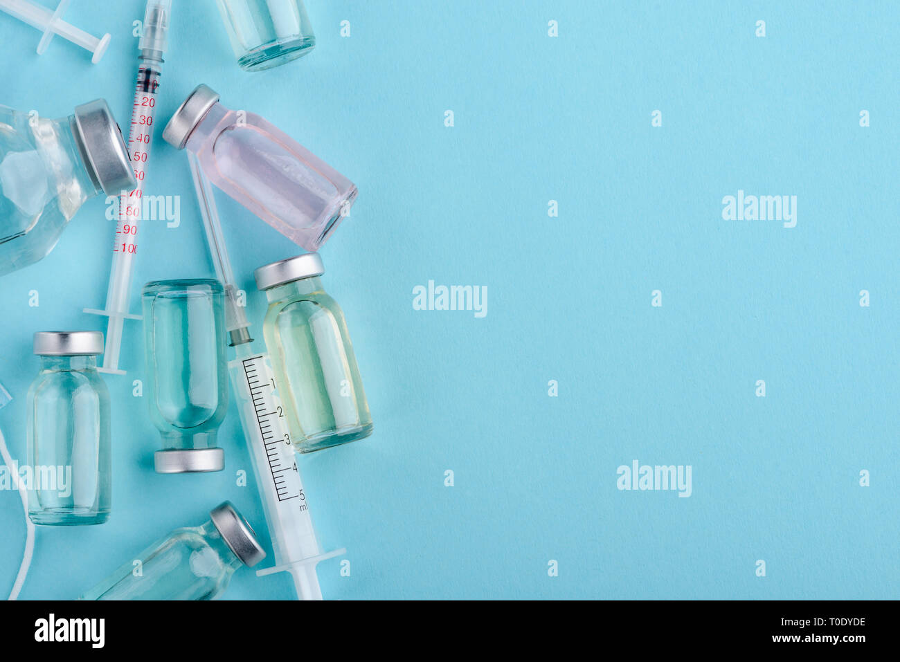 Vials of medication and syringes Stock Photo - Alamy