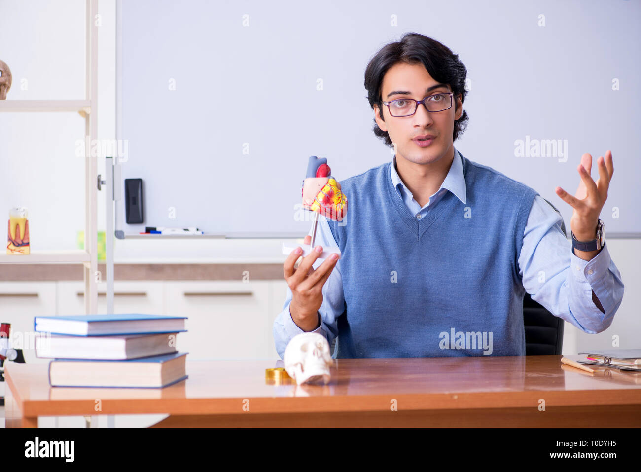Young lecturer teacher teaching anatomy Stock Photo - Alamy