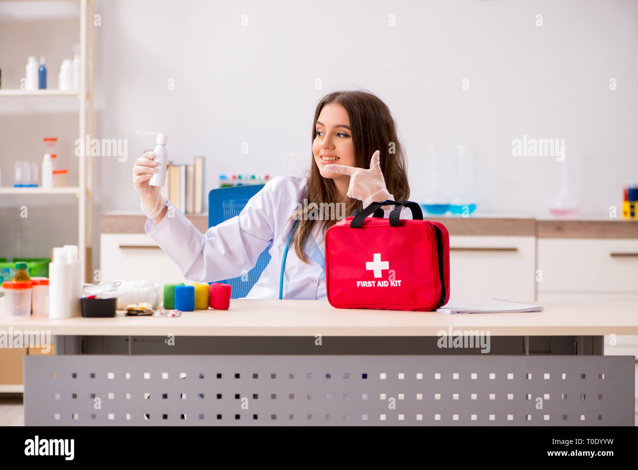 Female beautiful doctor with first aid bag Stock Photo - Alamy