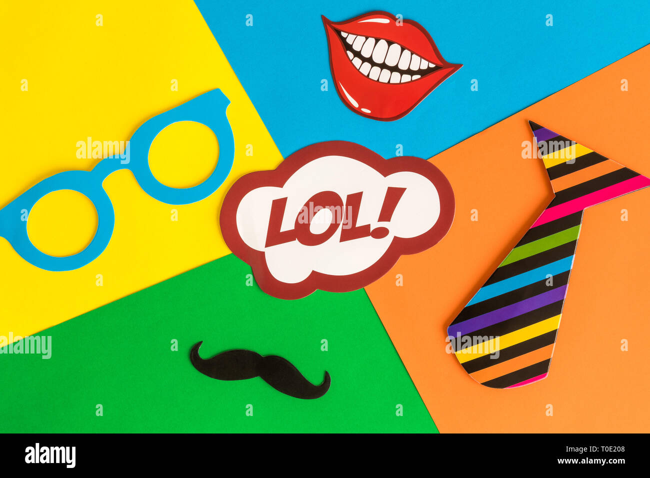 Paper props against colorful background minimal creative party concept ...