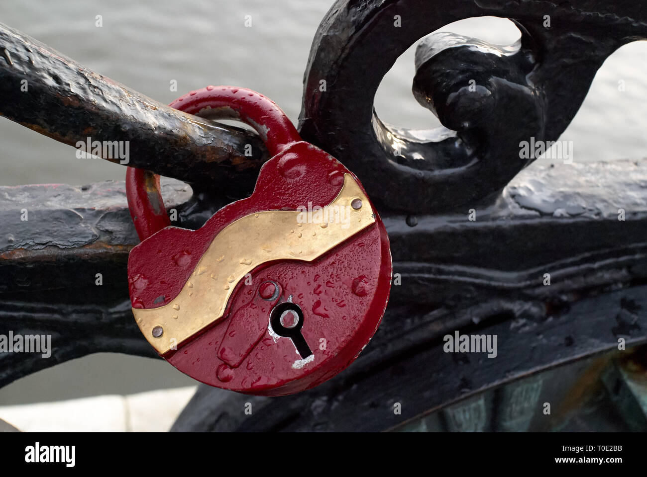 Wedding lock on a metal fencing on bridge Stock Photo - Alamy