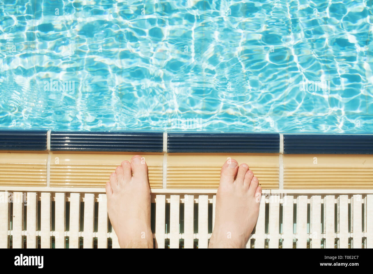 Feet in pool hi-res stock photography and images - Alamy
