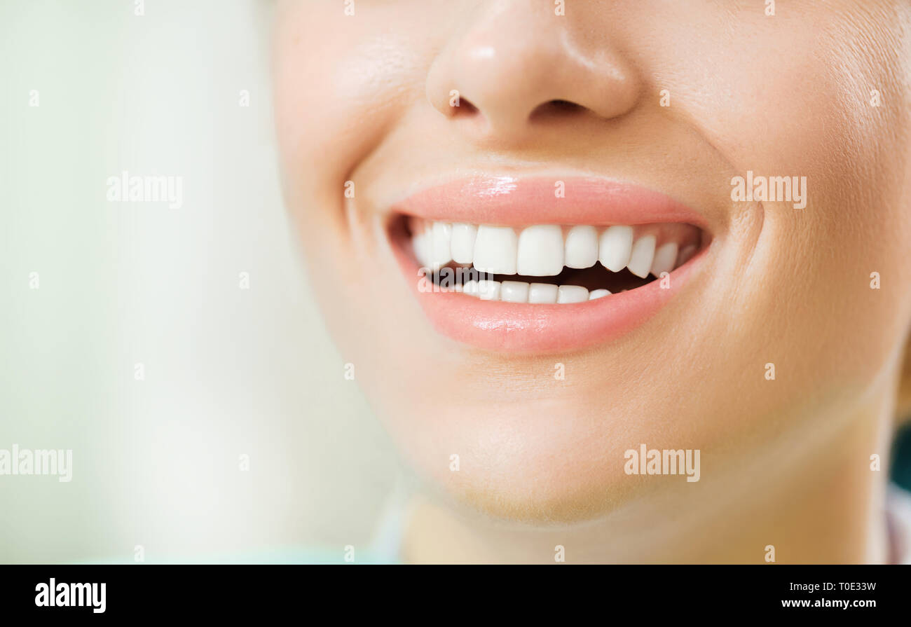 Beautiful female smile close up Stock Photo - Alamy