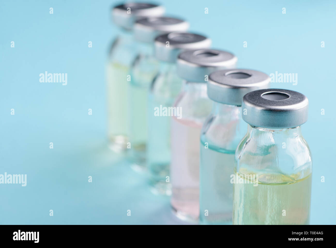 Row of injection vials Stock Photo - Alamy