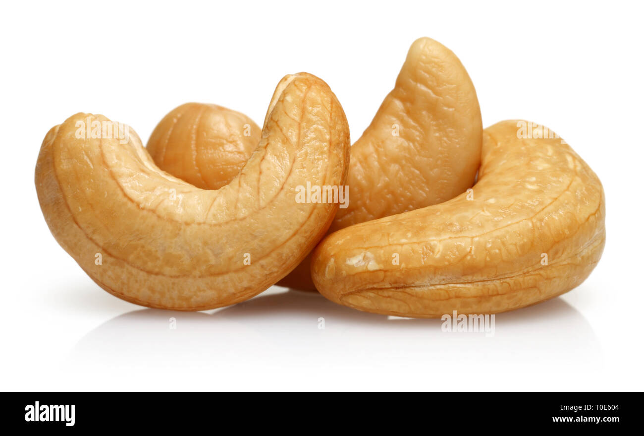 Roasted cashew nuts isolated on white background Stock Photo - Alamy
