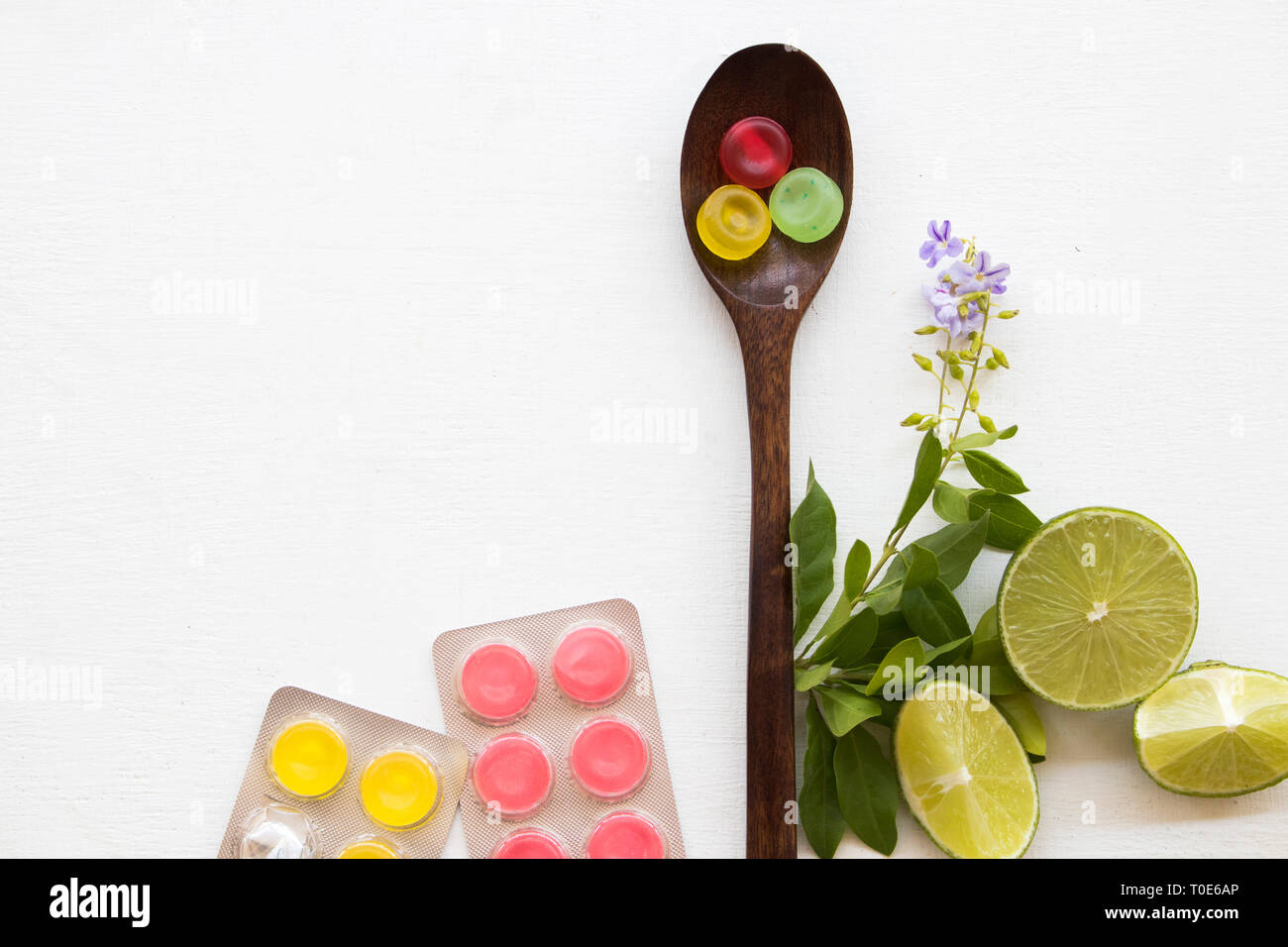 colorful lozenge and lemon slice health care sore throat with purple ...