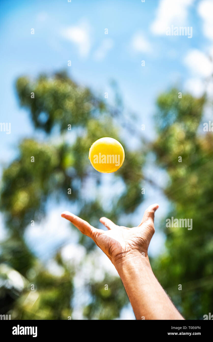 Hand releasing ball hi-res stock photography and images - Alamy