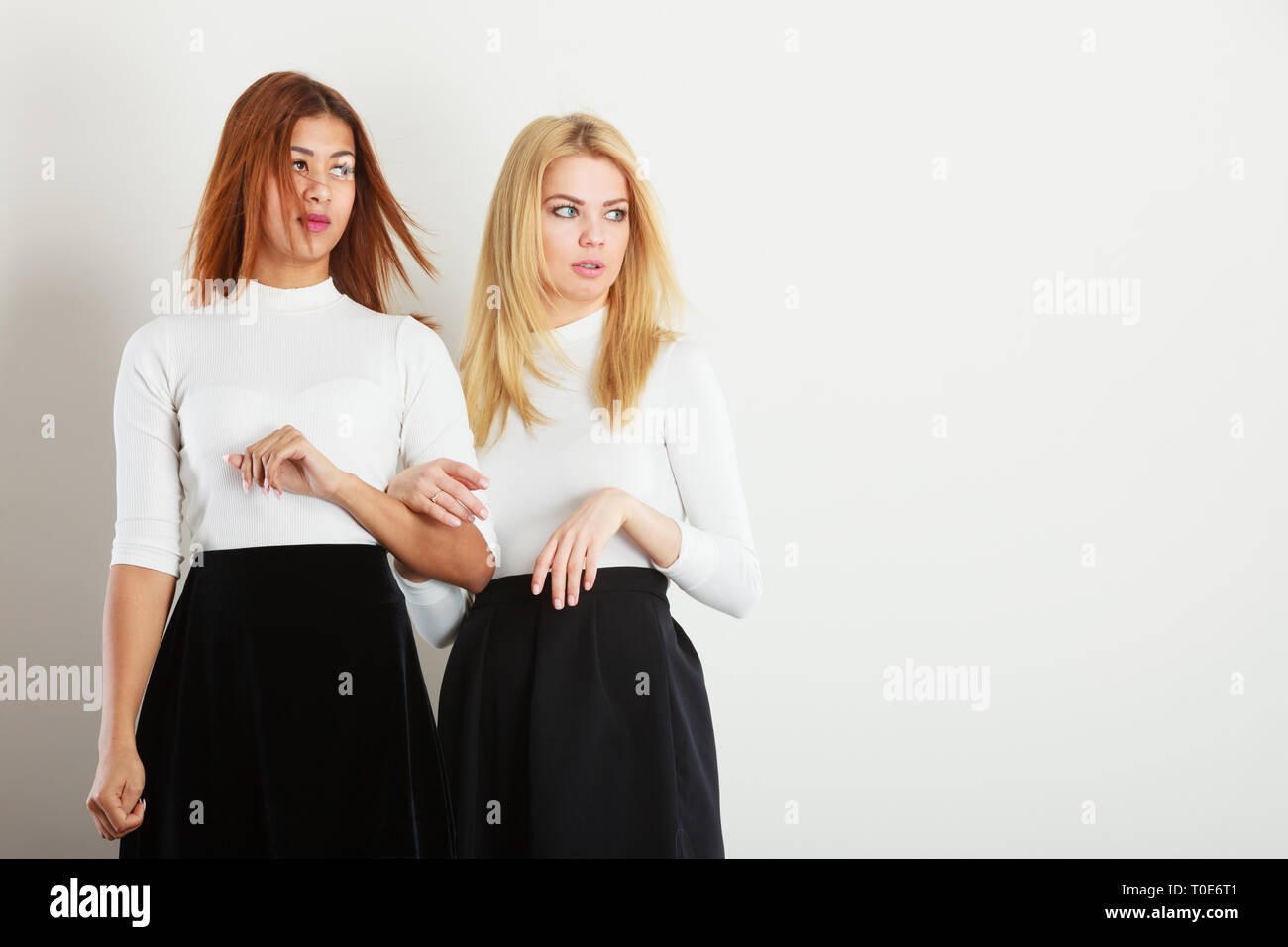 Friends people concept. Two young friends together. Girls have white ...