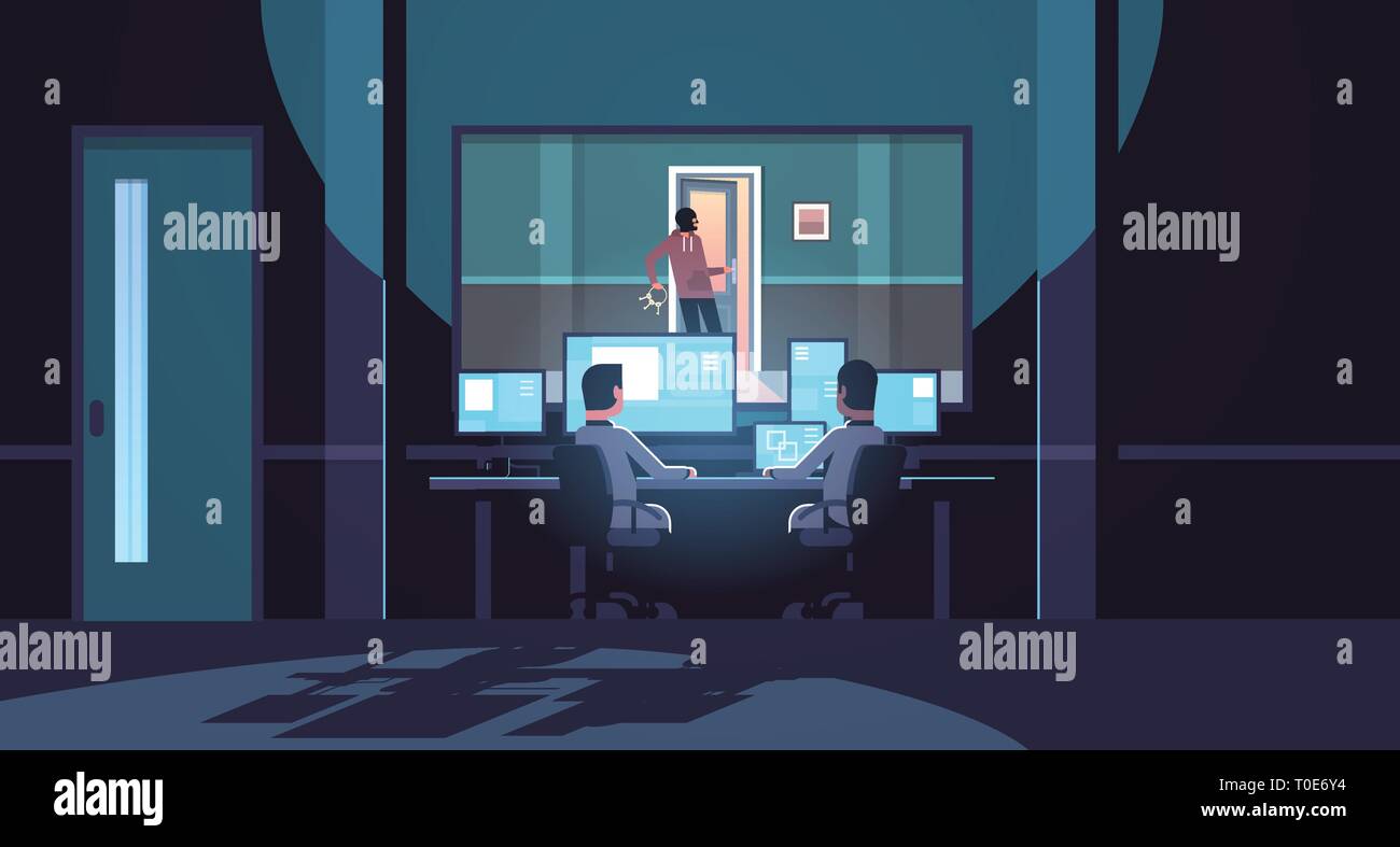 two agents looking at monitors behind glass criminal thief in mask with ...
