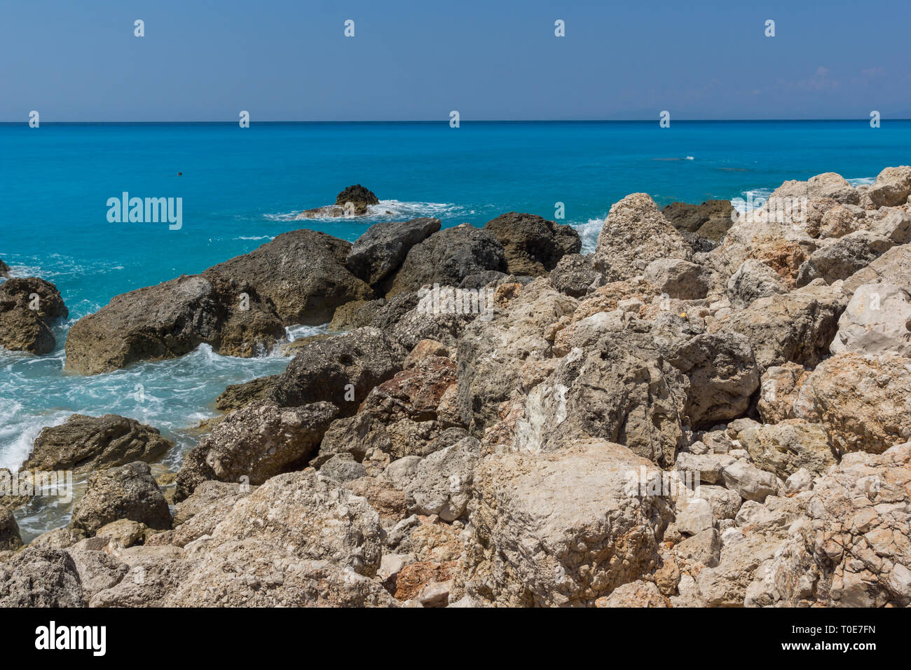 Seascape of blue waters and rocks of Megali Petra Beach, Lefkada ...