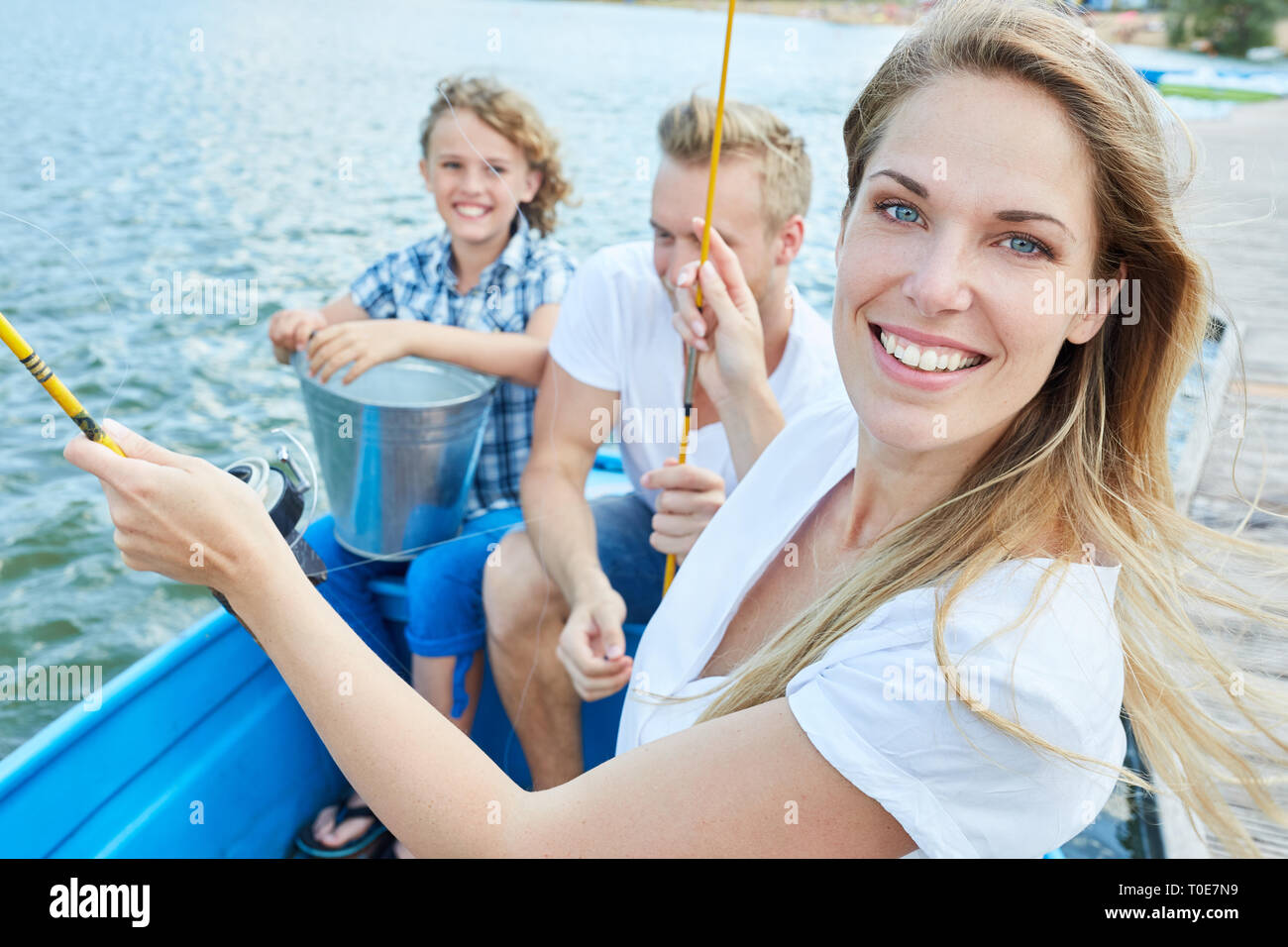 Family boat fishing hi-res stock photography and images - Alamy