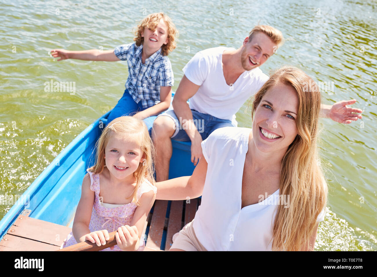 Two children on a rowing boat hi-res stock photography and images - Alamy