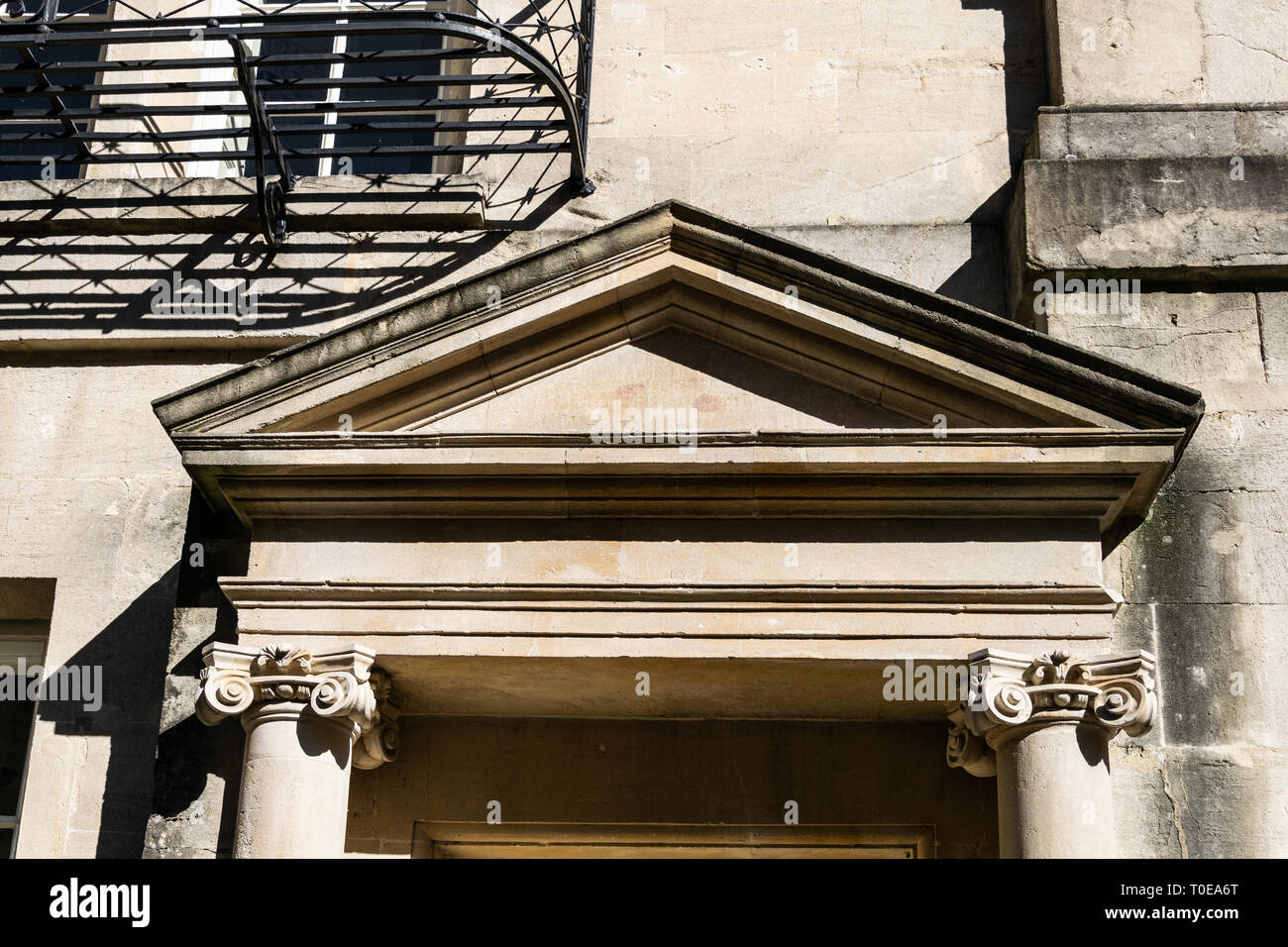 The pediment of a doorway on Brock Street, Bath with engaged Ionic ...
