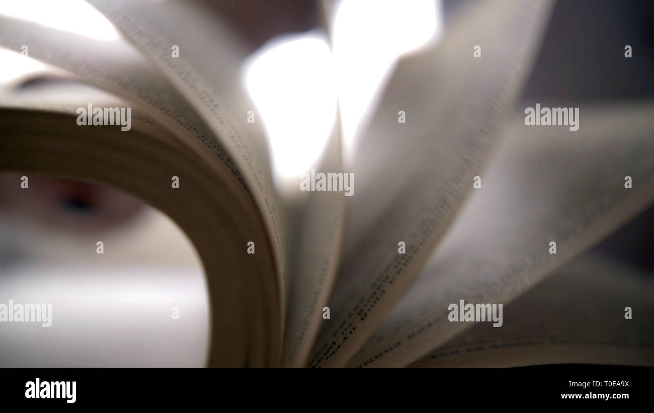 Flipping through magazine hi-res stock photography and images - Alamy