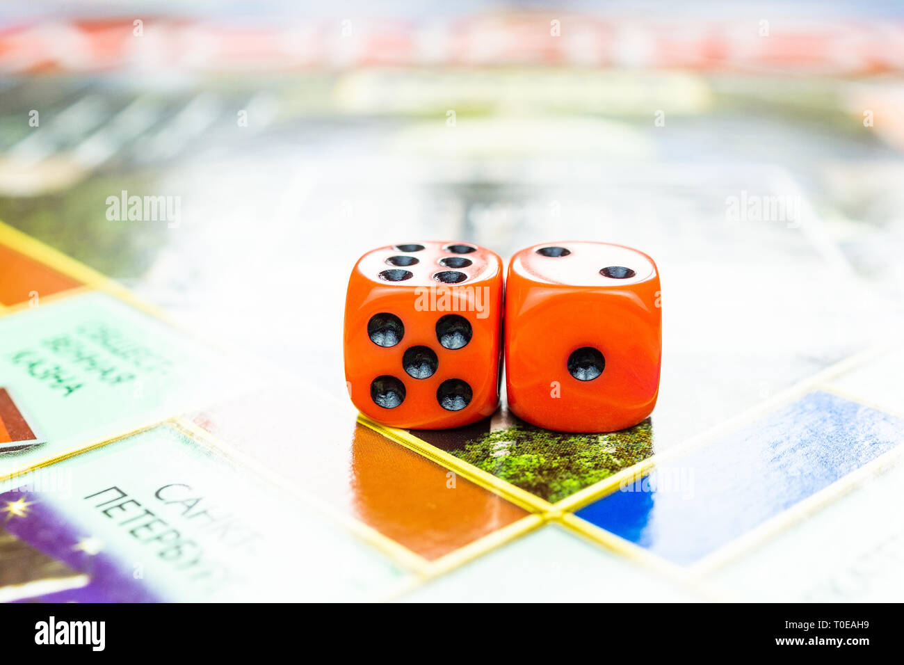 cubes lie on the board game monopoly Stock Photo - Alamy