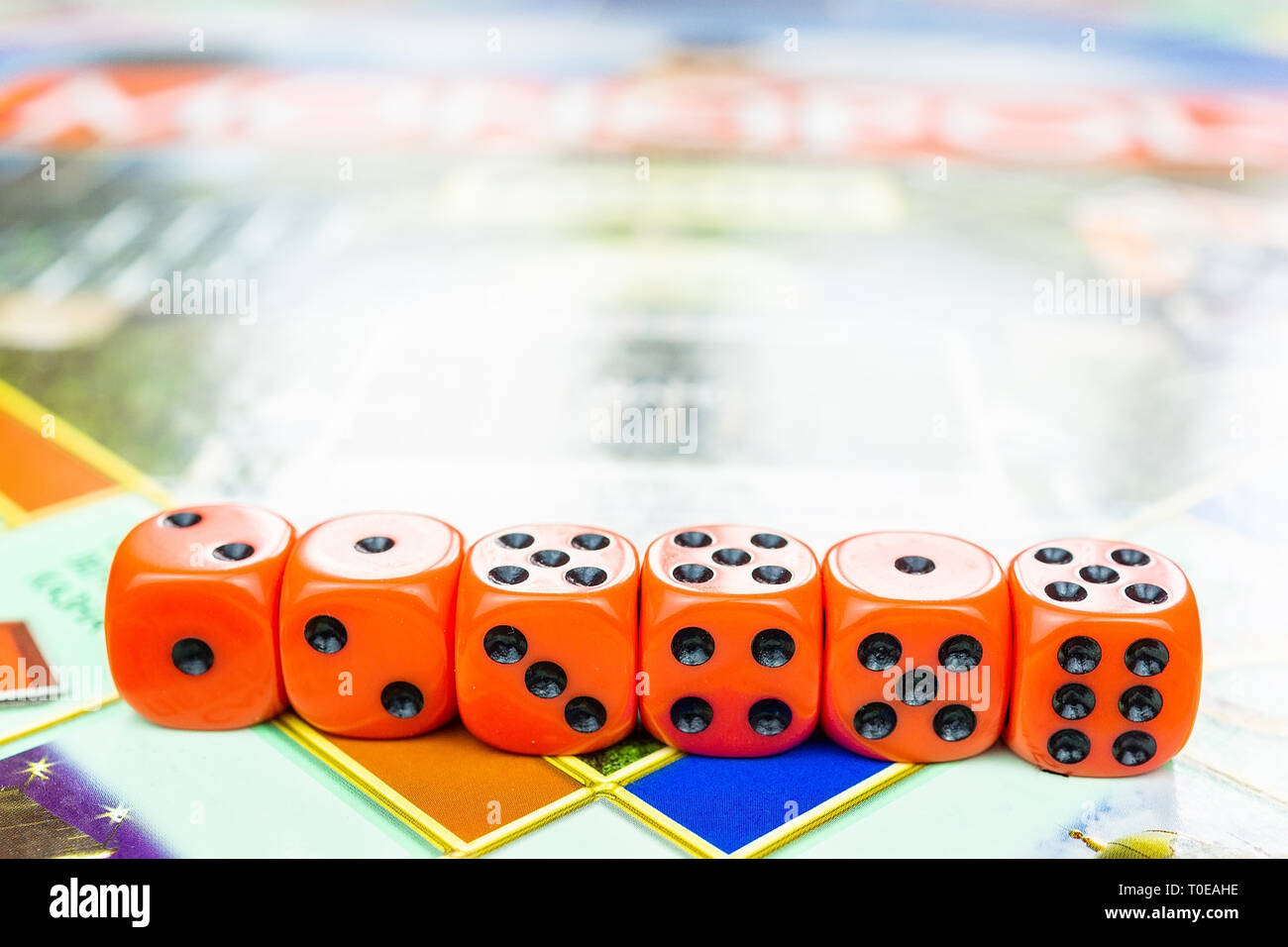 cubes lie on the board game monopoly Stock Photo - Alamy
