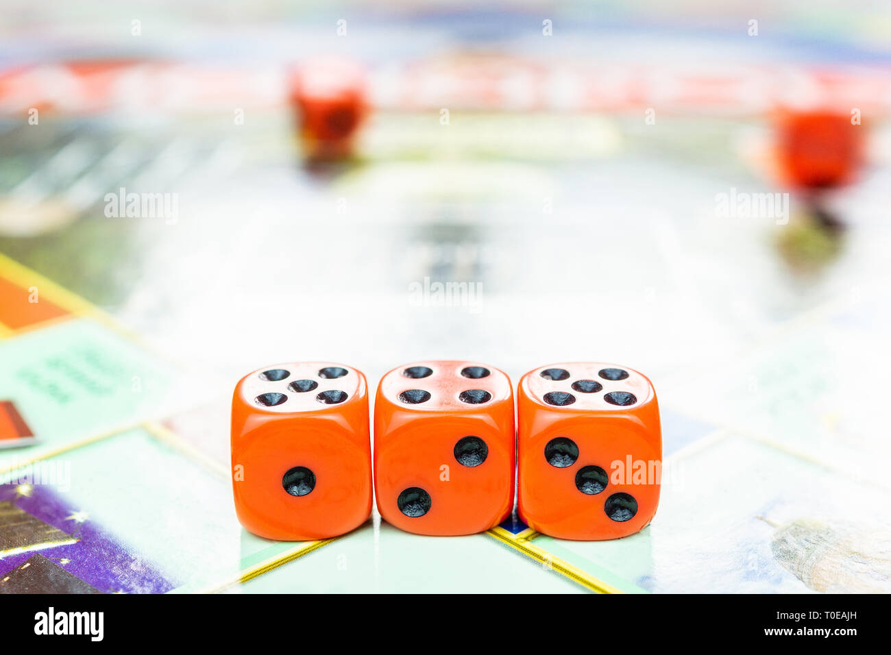 cubes lie on the board game monopoly Stock Photo - Alamy