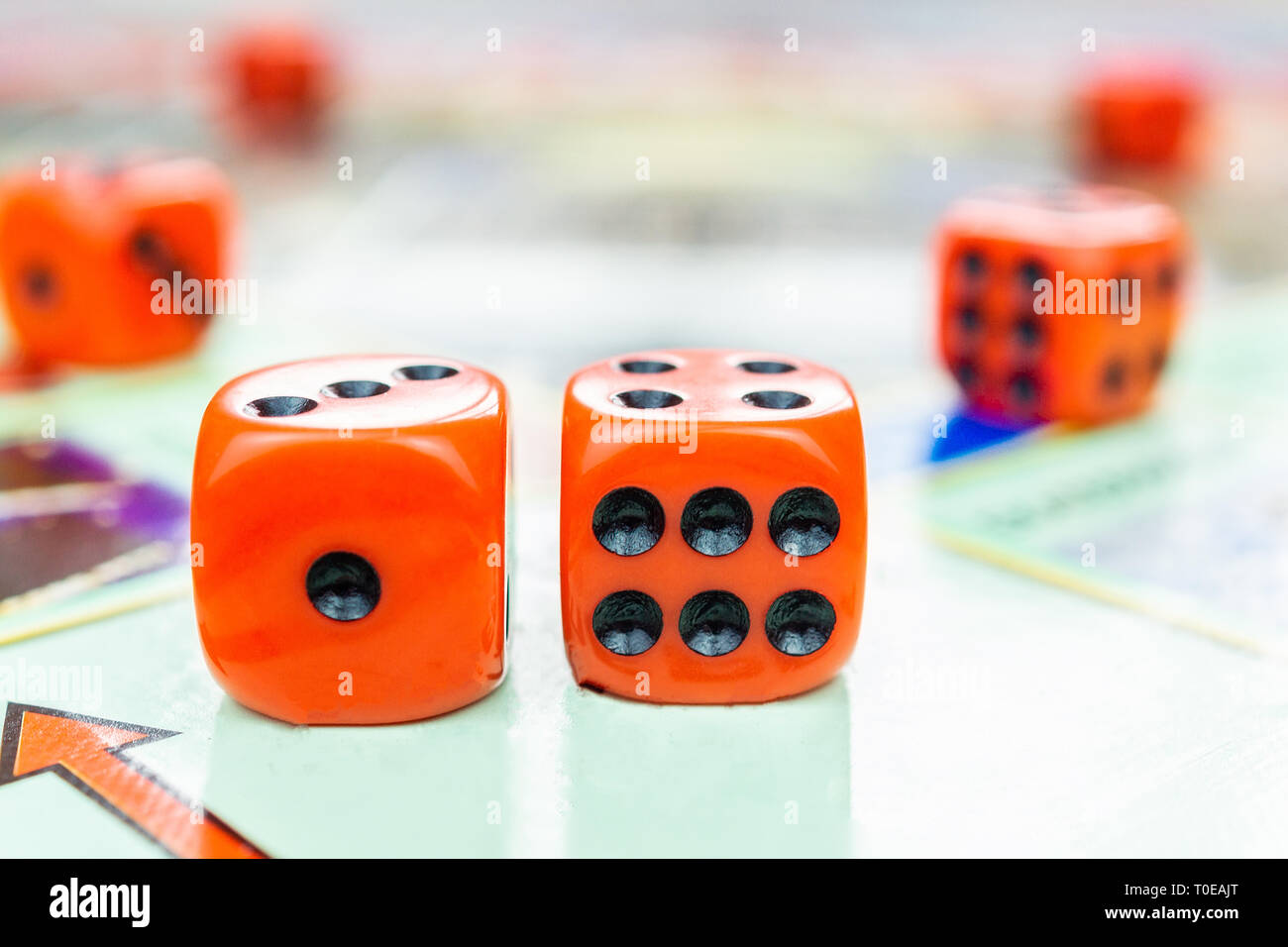 cubes lie on the board game monopoly Stock Photo - Alamy