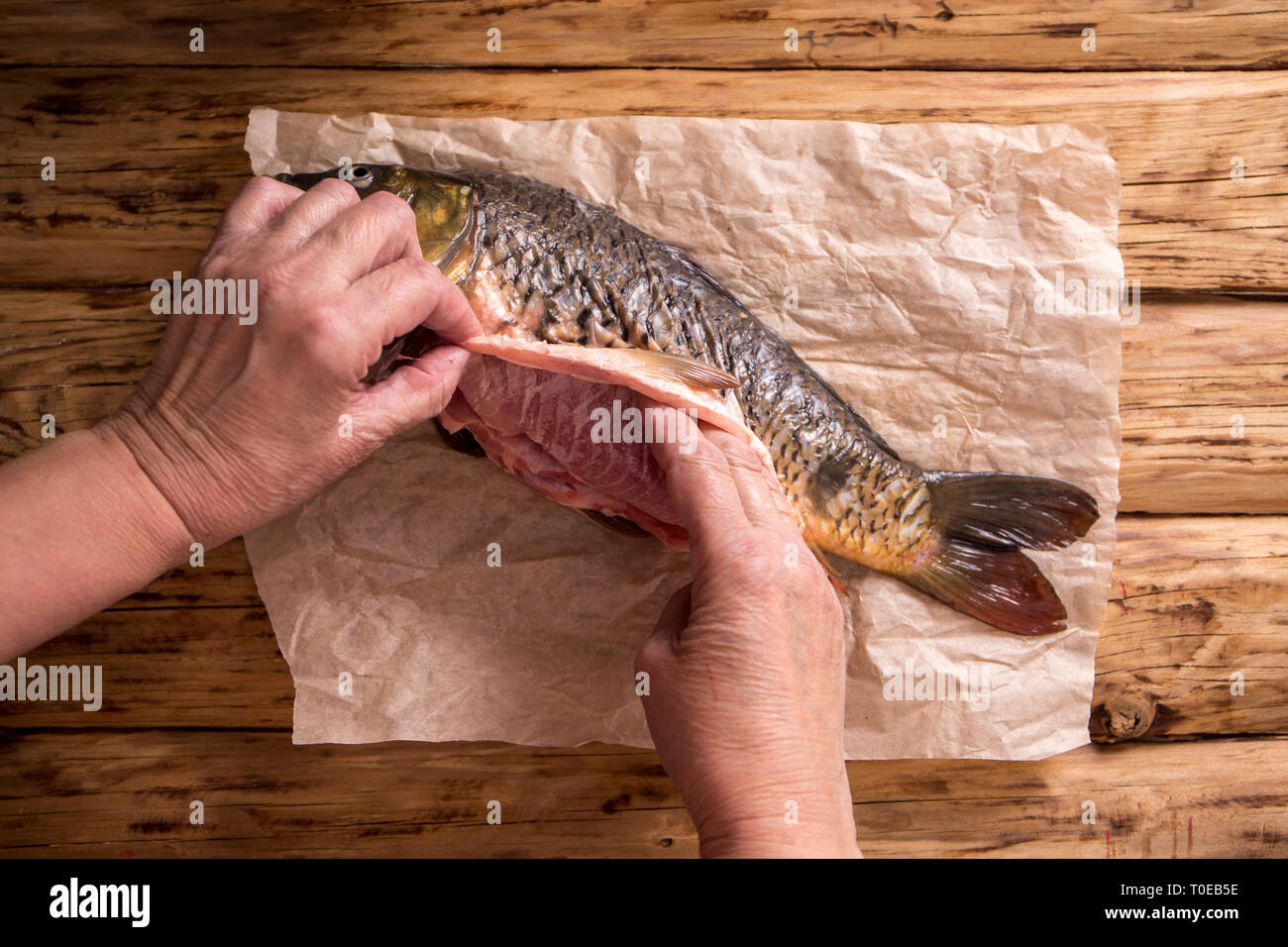 Cutting off skin hi-res stock photography and images - Alamy