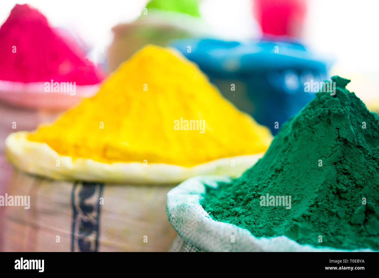 Gulal color powder piled in sacks at street side shops for the indian ...