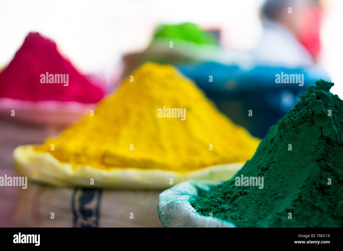 Gulal color powder piled in sacks at street side shops for the indian ...