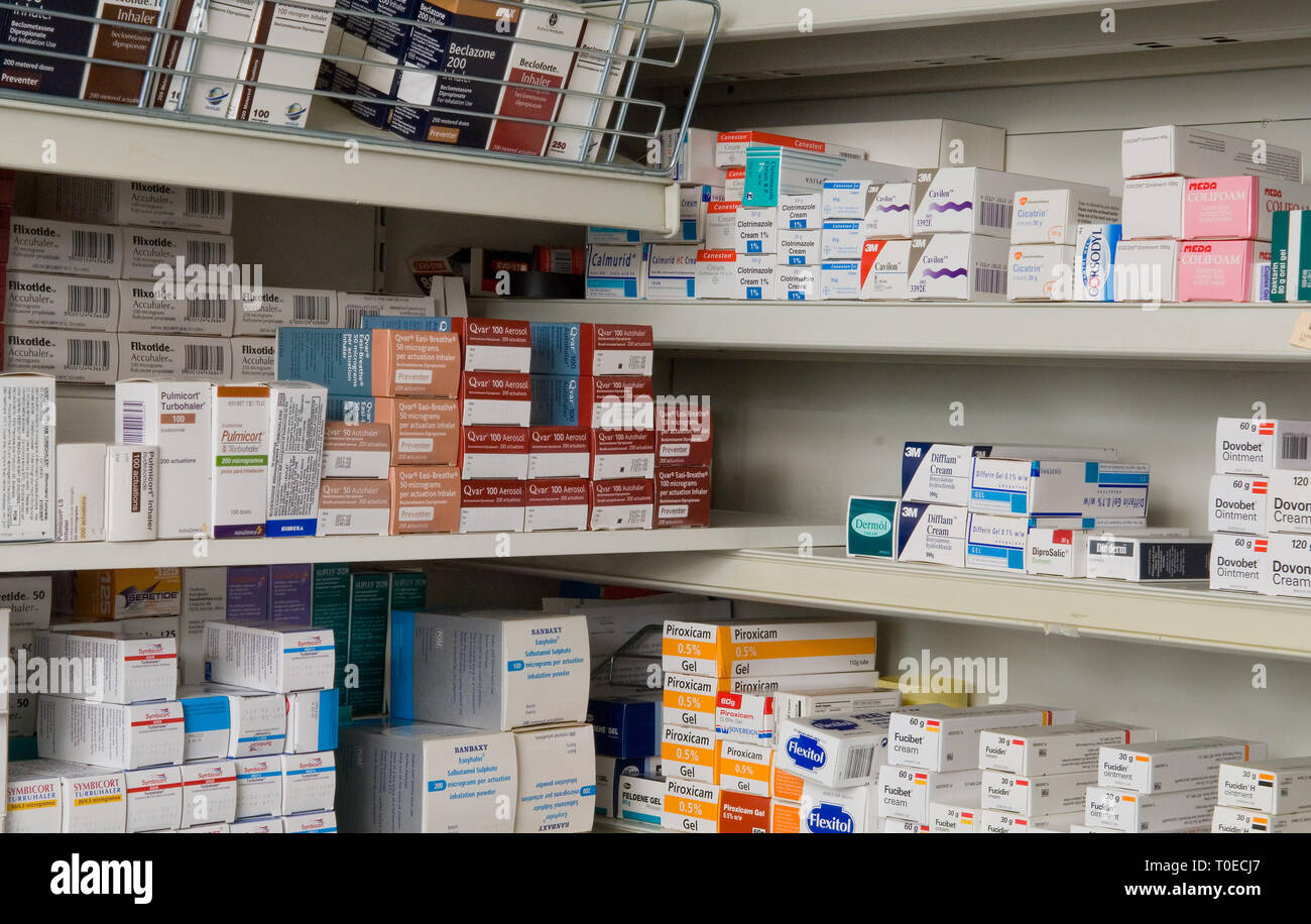 Various medications and drugs on chemist shelves in a pharmacy Stock ...