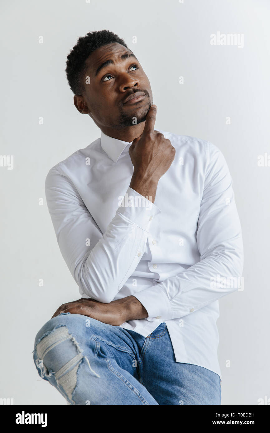 Remember all. Let me think. Doubt concept. Doubtful, thoughtful afro ...