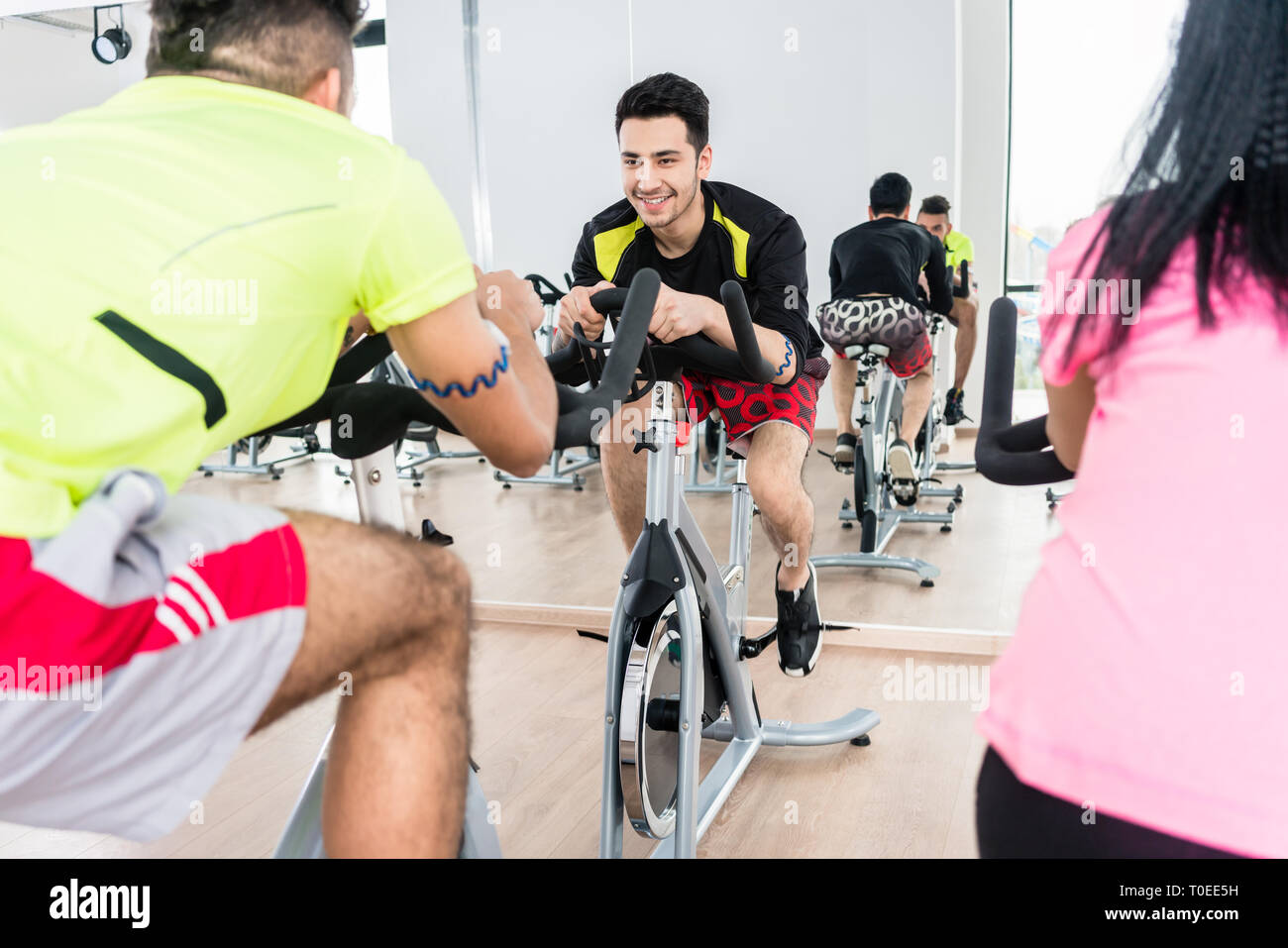 Man reflection on gym mirror Stock Photo - Alamy