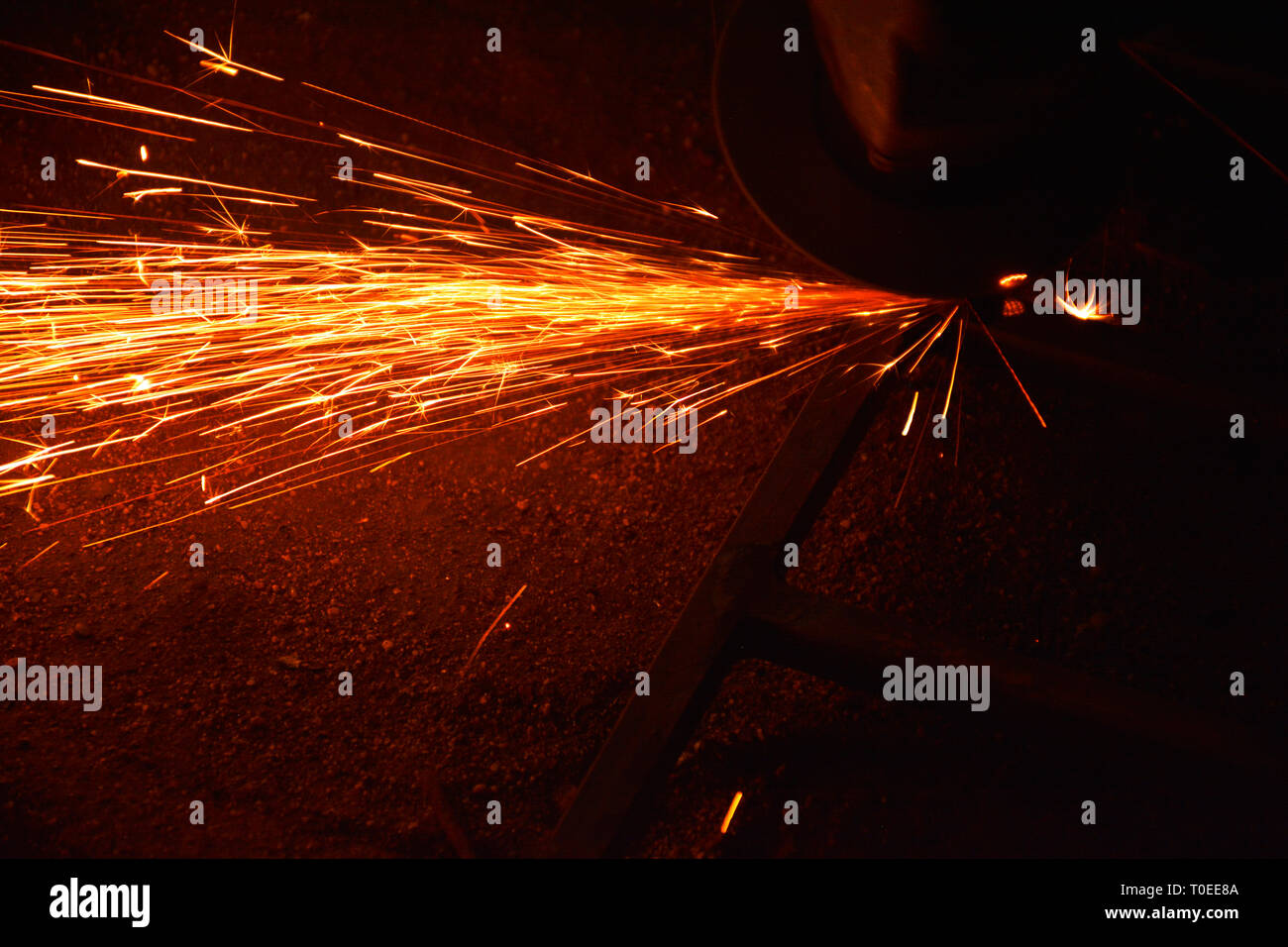 Magic glowing Flow of Sparks in the Dark background Stock Photo - Alamy