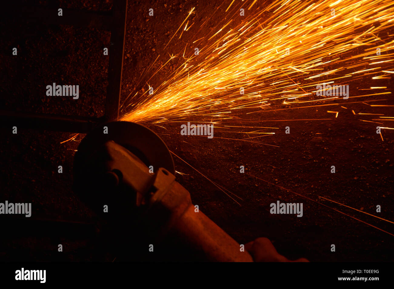 Magic glowing Flow of Sparks in the Dark background Stock Photo - Alamy