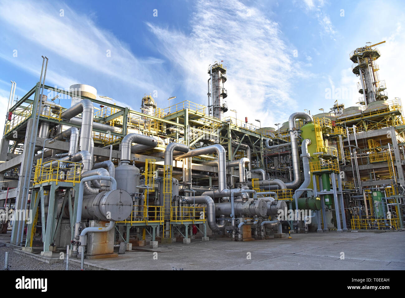 pipelines and buildings of a refinery - industrial plant for fuel ...
