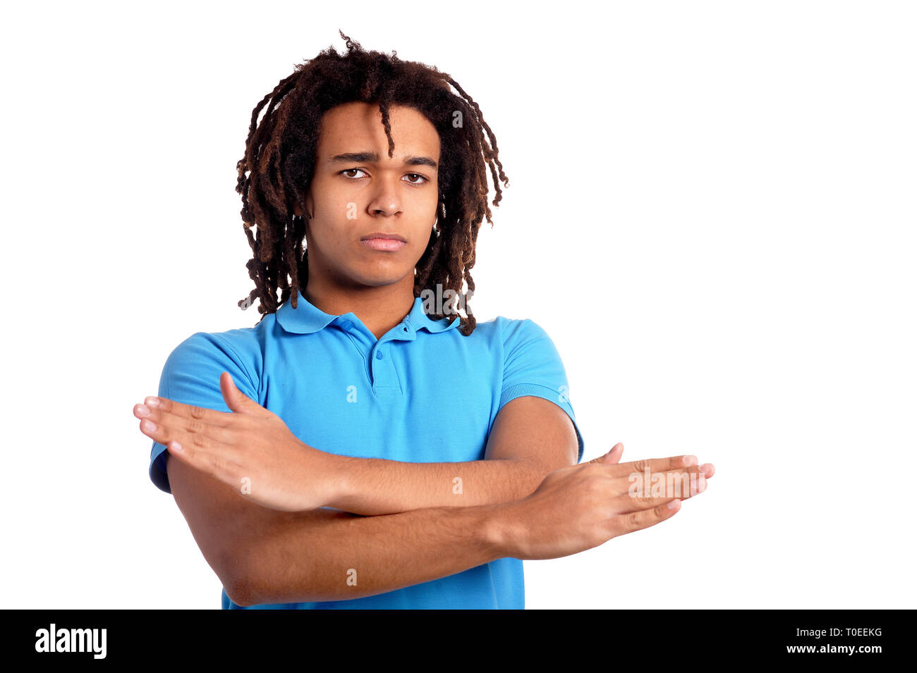 Portrait of young man posing against white background Stock Photo - Alamy