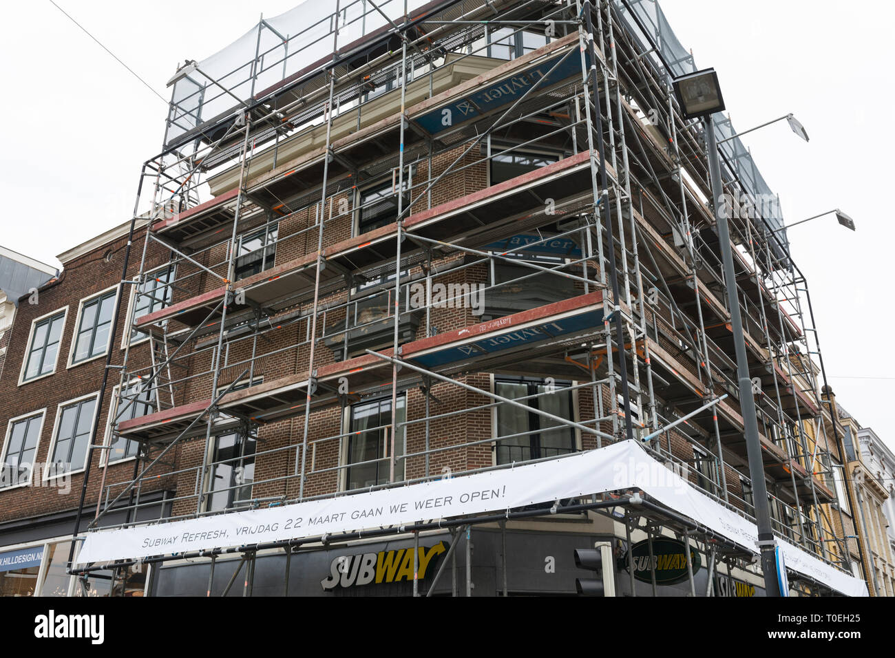 Renovation of an apartment building in the inner city with scaffolding ...