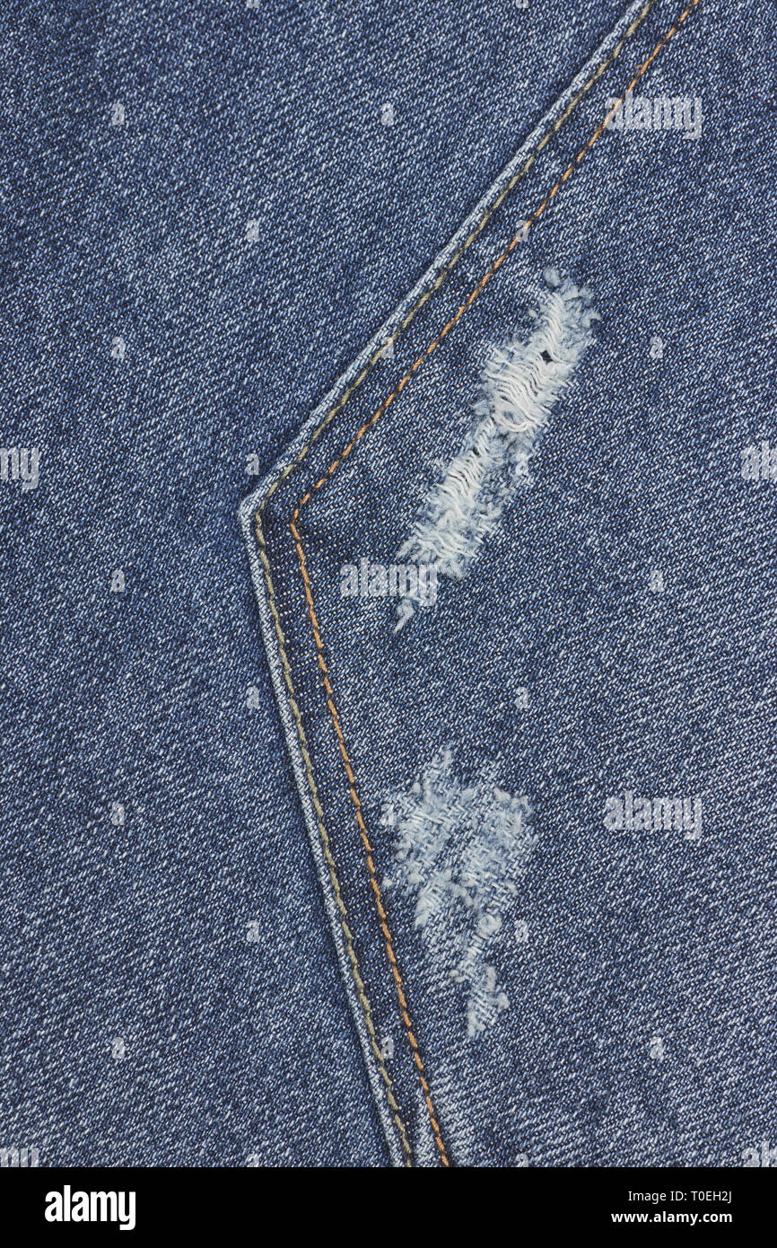 Denim ripped blue jeans texture. Abstract background faded jeans Stock ...