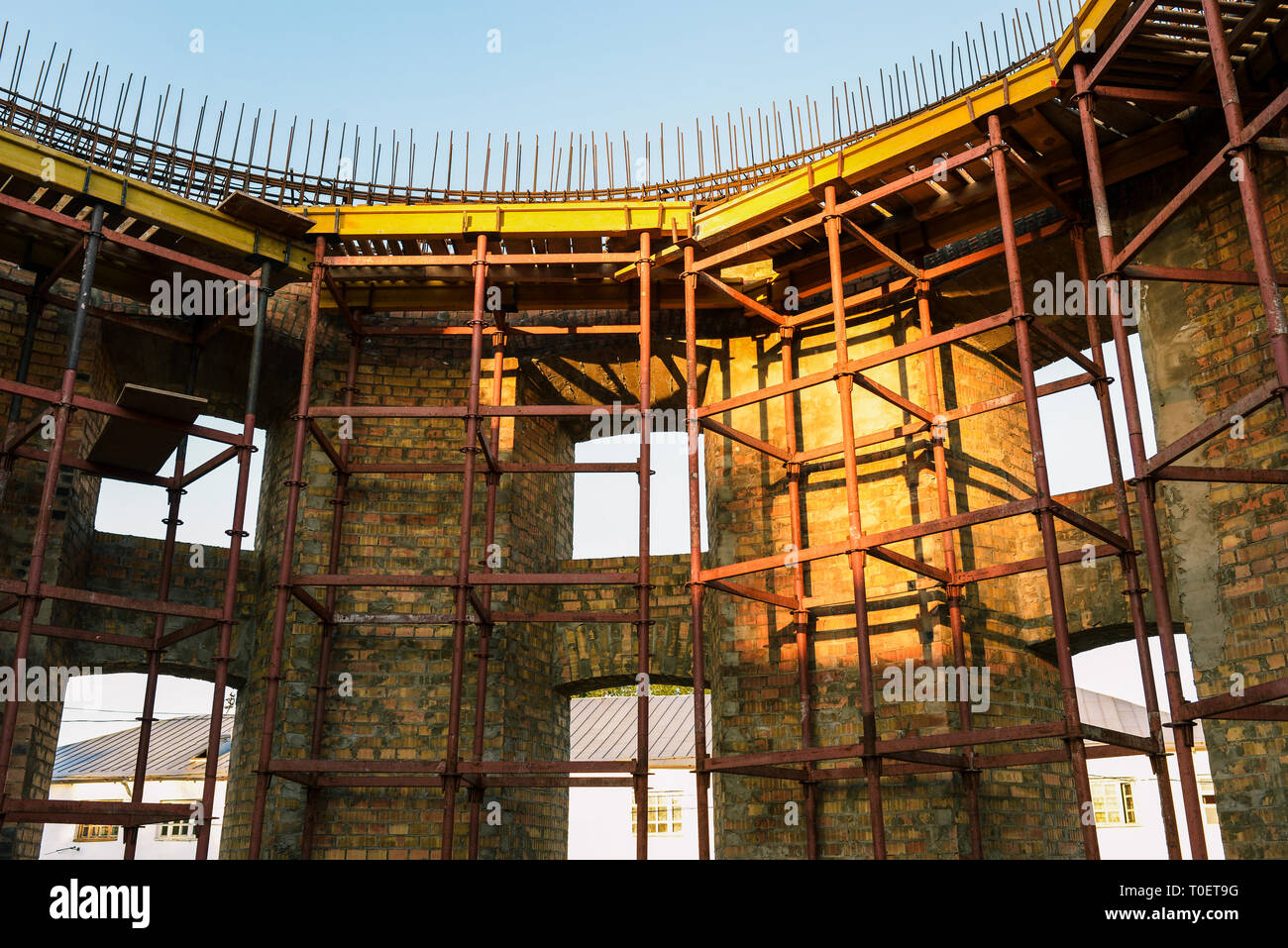 Construction site. The frame and walls of the house are made of bricks ...