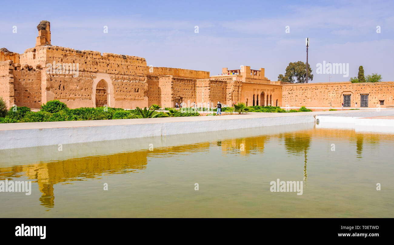 Reflection in the pool in Badi Palace in the Medina of Marrakech ...