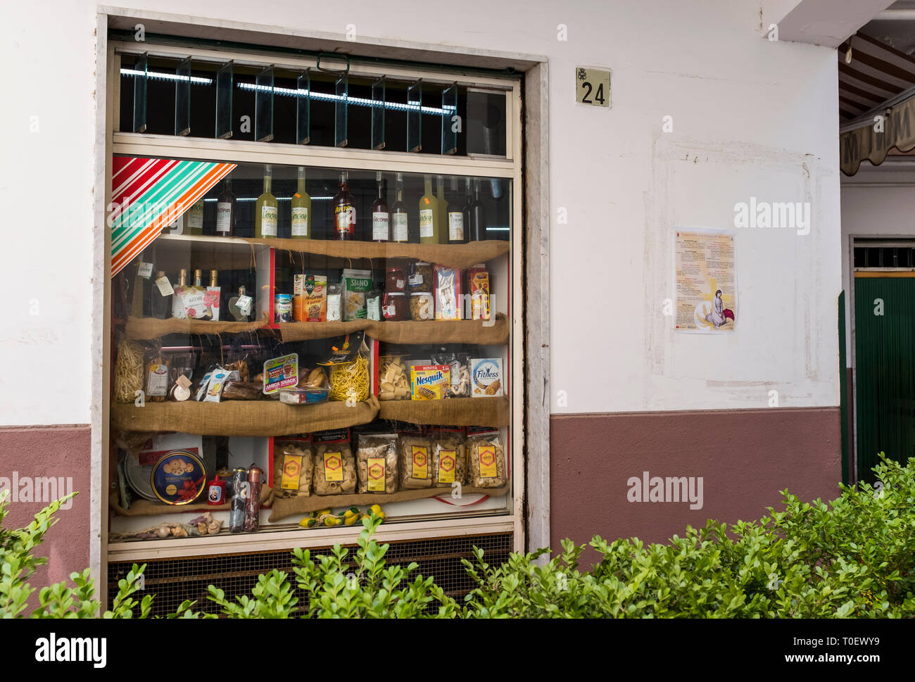 Shop window displaying food and beverages in Minori, Italy on the ...