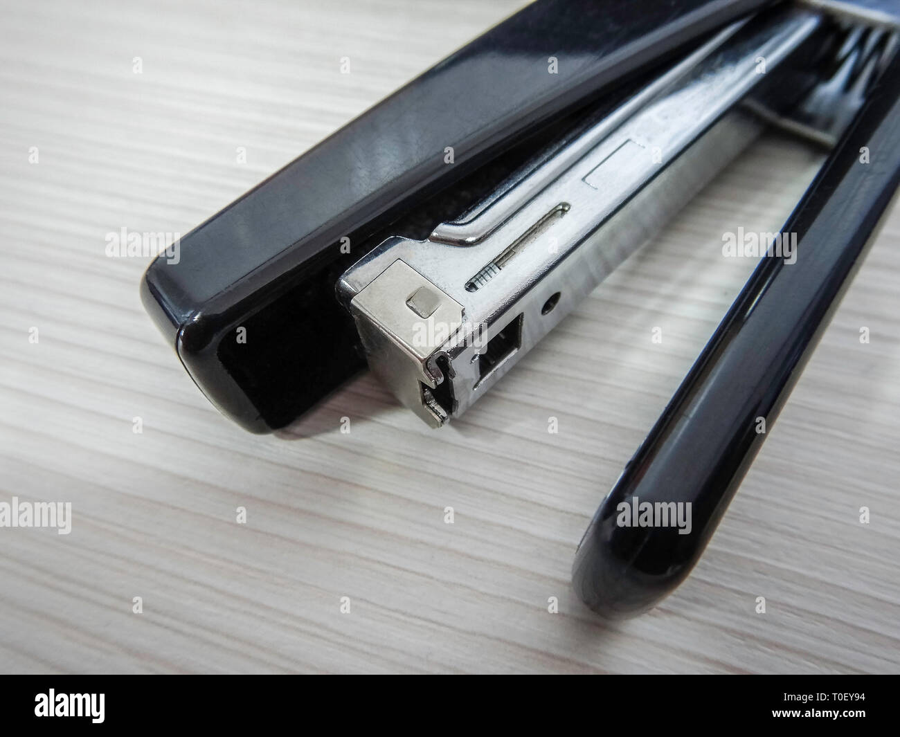 Black stapler close up diagonal shot Stock Photo - Alamy
