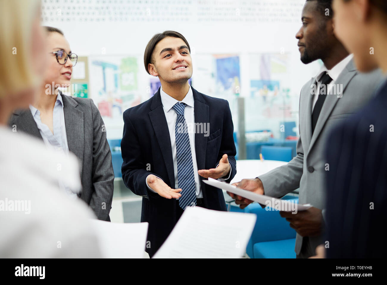Office Workers Talking Stock Photo - Alamy