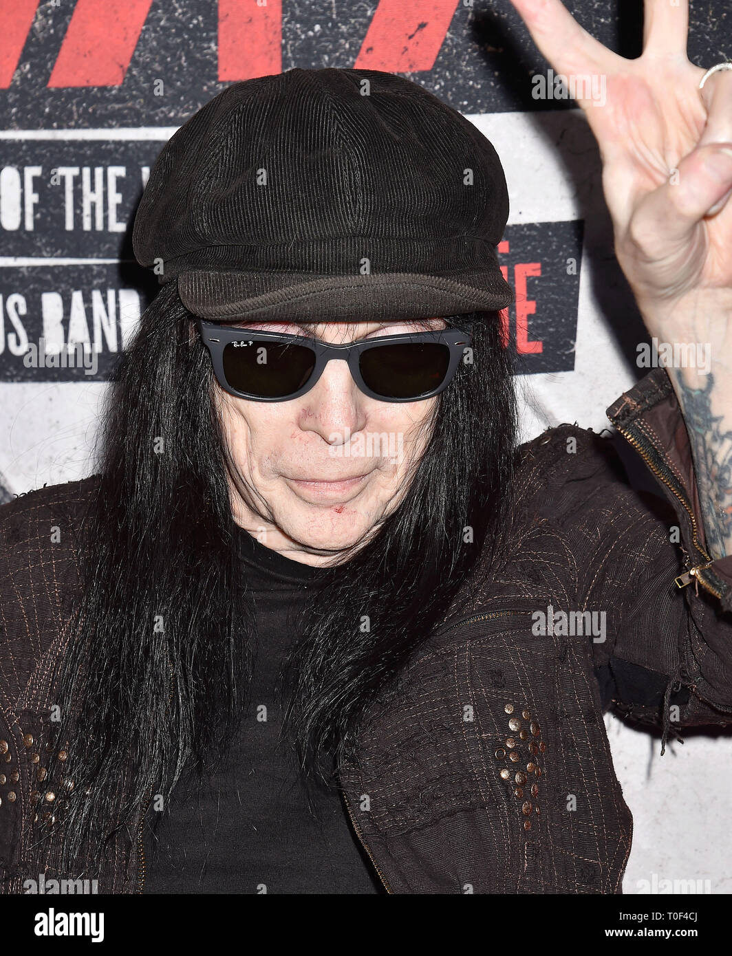 HOLLYWOOD, CA - MARCH 18: Mick Mars arrives at the Premiere Of Netflix ...