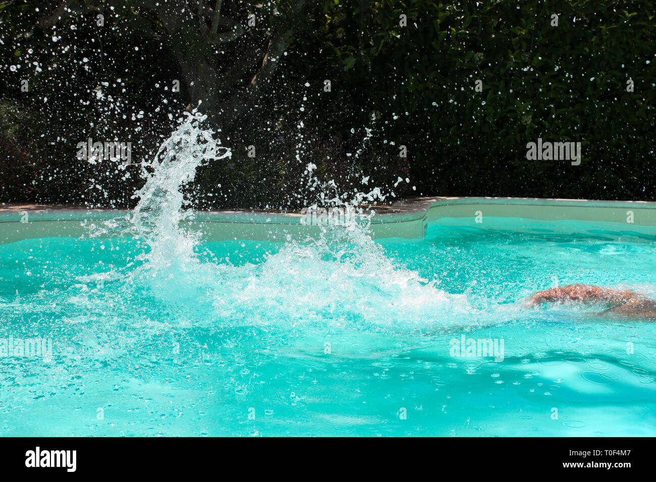 Man swims in pool resort hi-res stock photography and images - Alamy