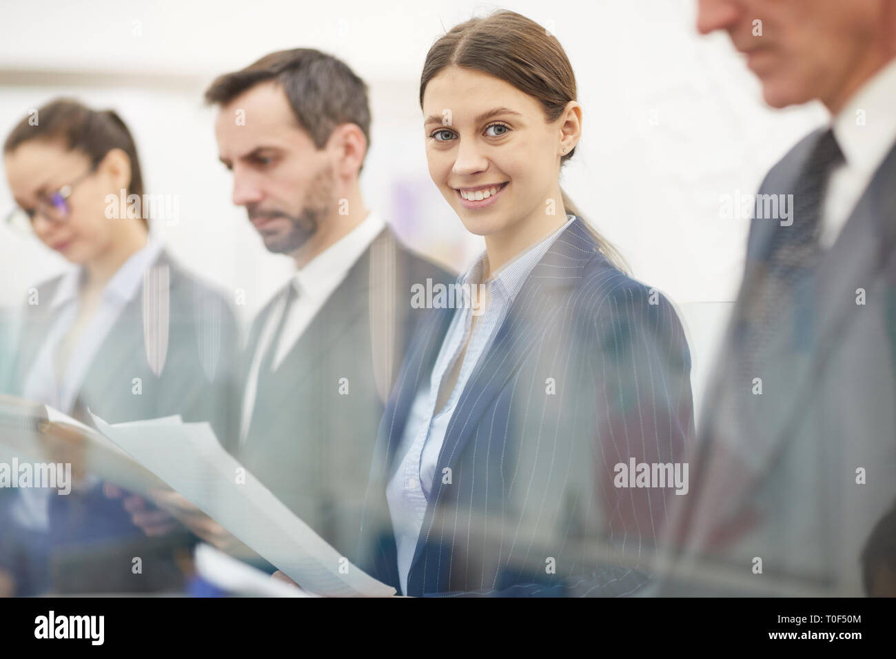 Business People Standing in Row Stock Photo - Alamy