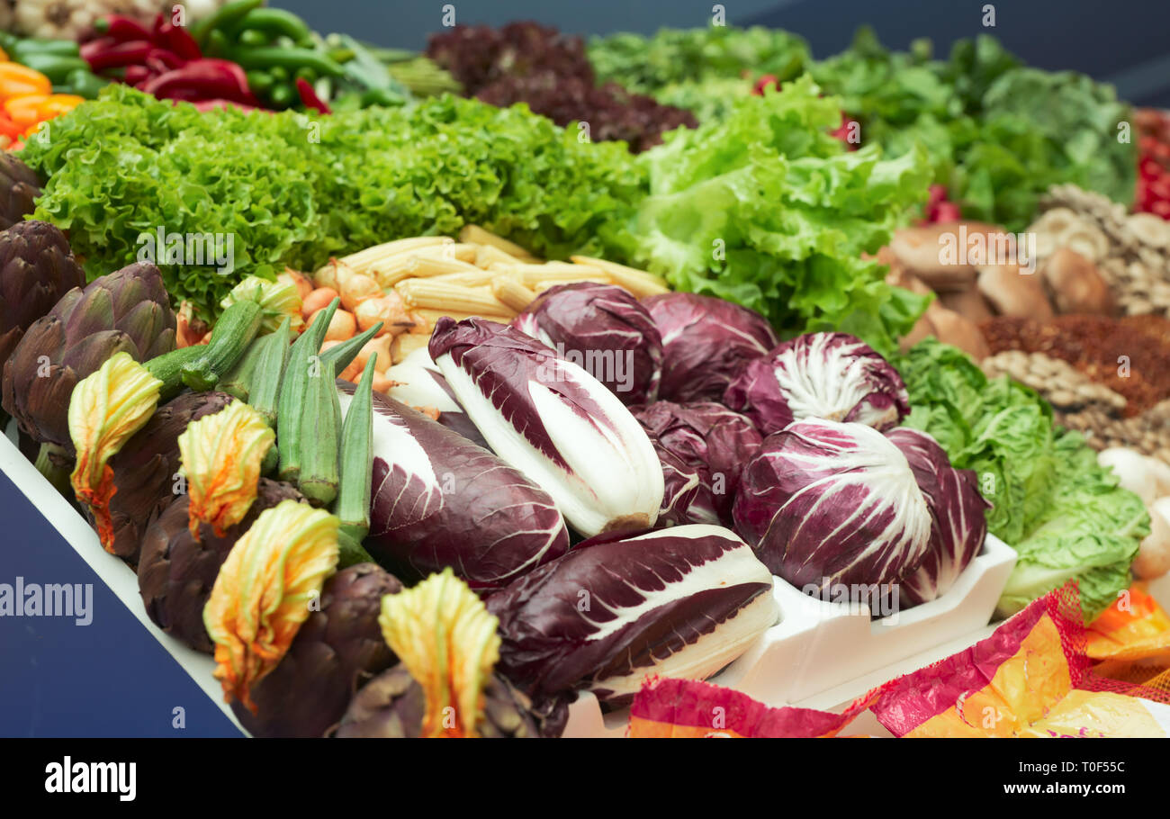 Vegetables and groceries in supermarket, focus is on cabbages Stock ...