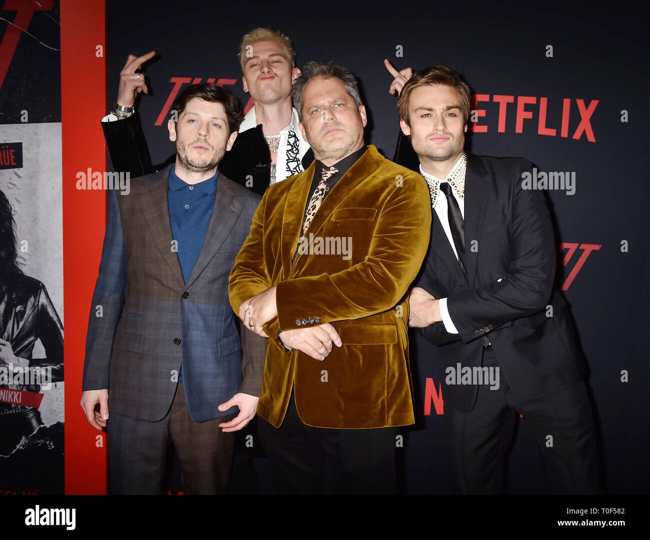 HOLLYWOOD, CA - MARCH 18: (L-R) Iwan Rheon, Jeff Tremaine, Colson Baker ...