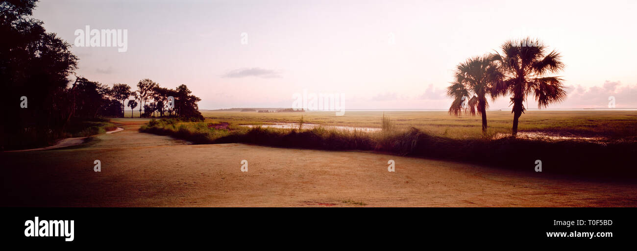 View of a scenic landscape beside a river Stock Photo - Alamy