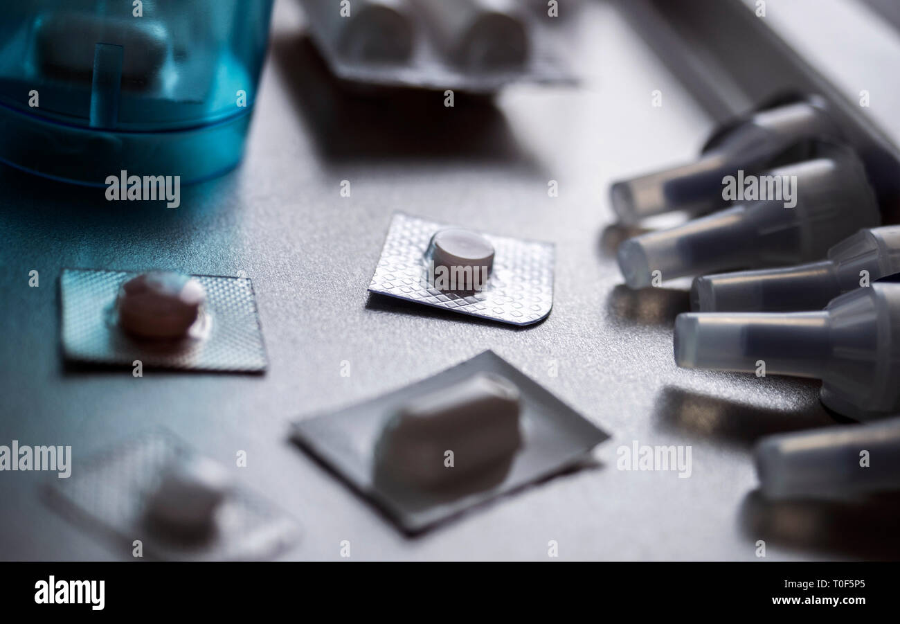 Different dosage medication in hospital, conceptual image, horizontal ...