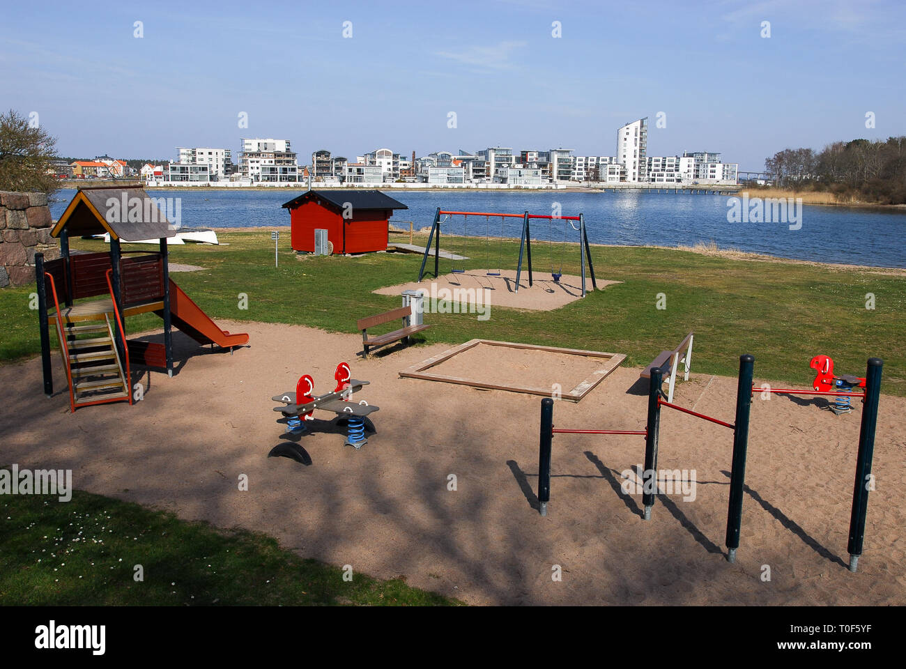 Playground on beach on Bastionen Regeringen and modern architecture ...